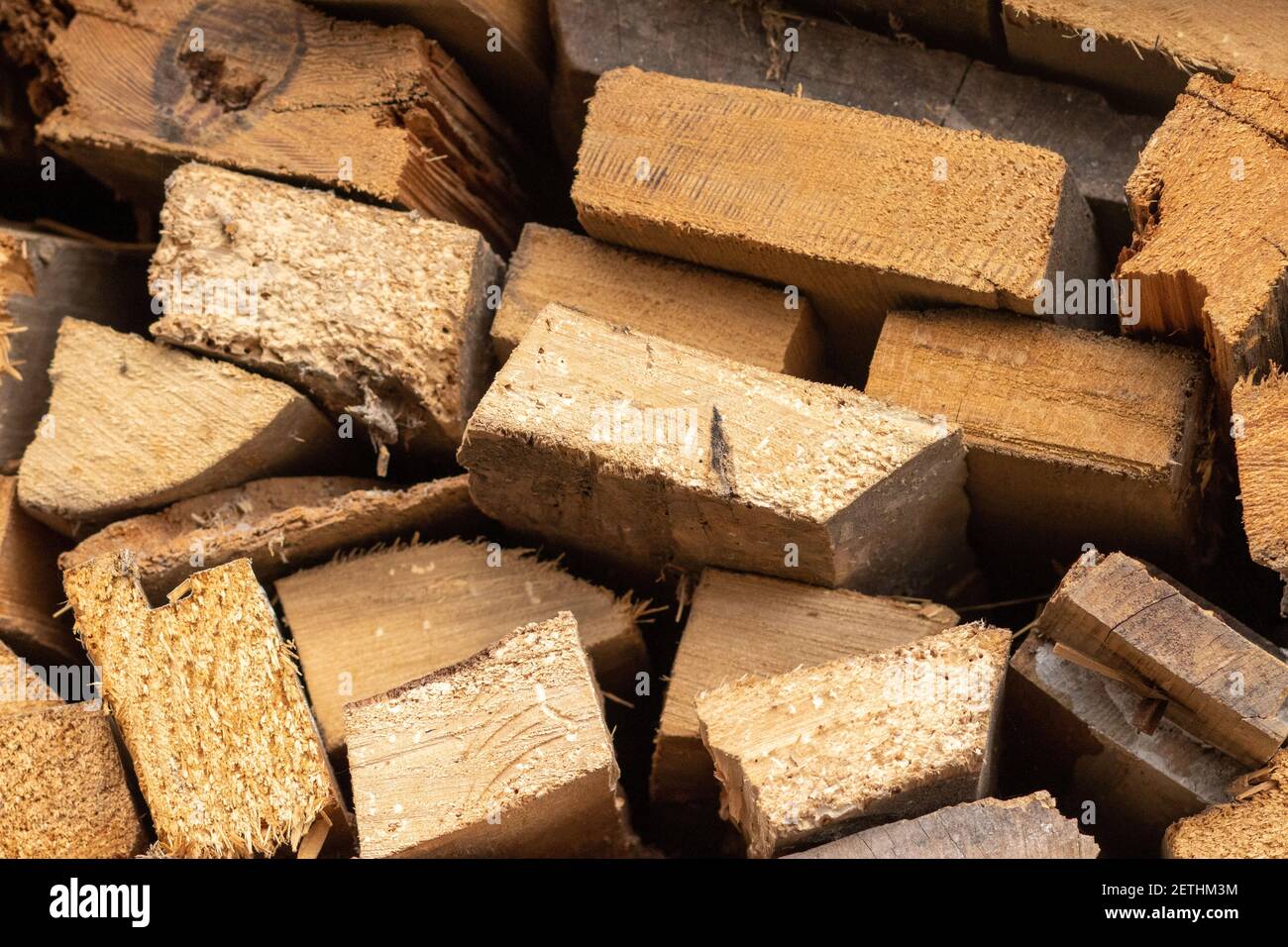 Background of chopped wood. Firewood for kindling the fireplace. Wood ...