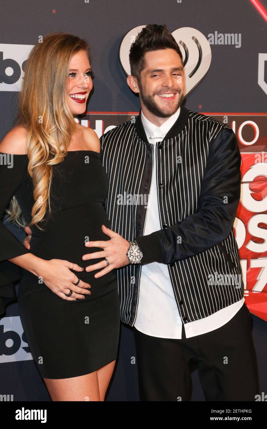Lauren Gregory (L) and singer-songwriter Thomas Rhett at the 2017 ...