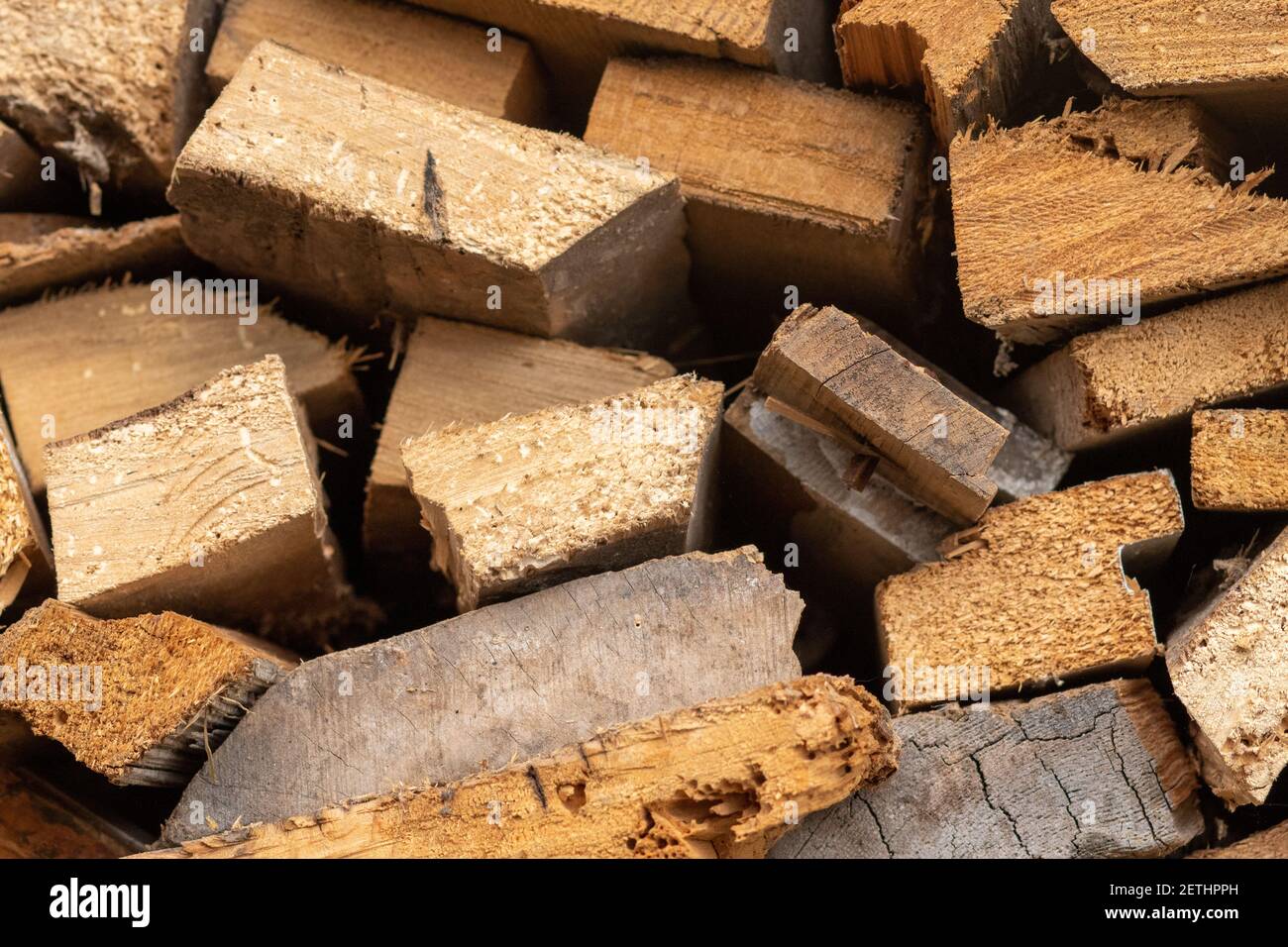 Background of chopped wood. Firewood for kindling the fireplace. Wood ...
