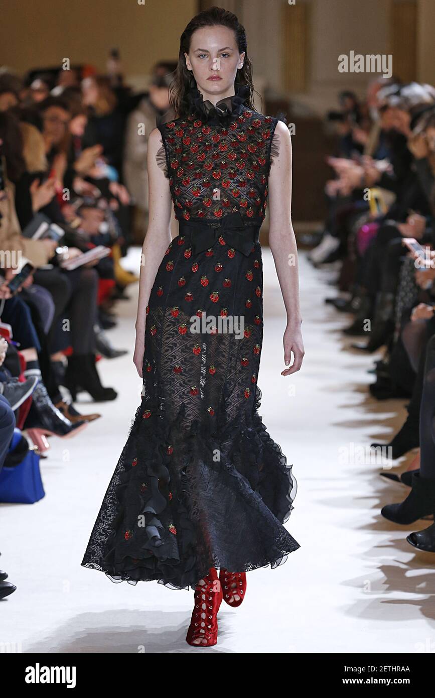 Model Lea Holzfuss walks on the runway during the Giambattista Valli ...