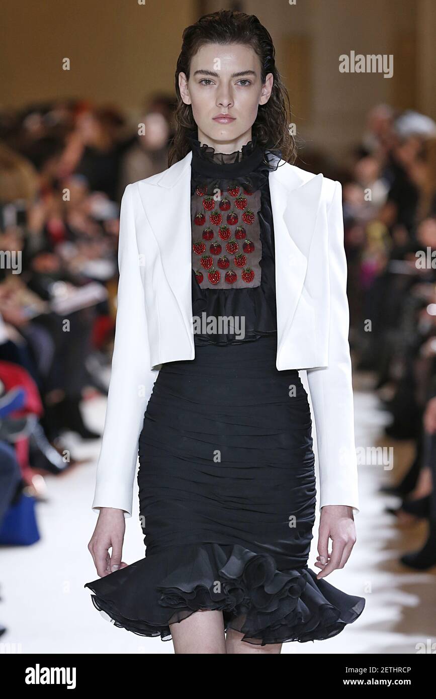 Model Marie Damian walks on the runway during the Giambattista Valli ...