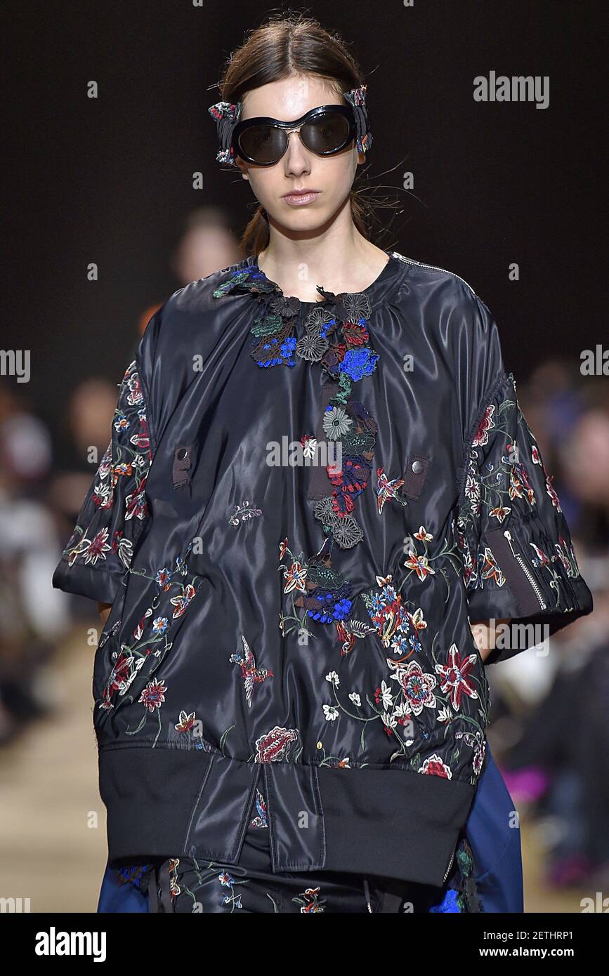 Model Madeleine Knighton walks on the runway during the Sacai Fashion ...