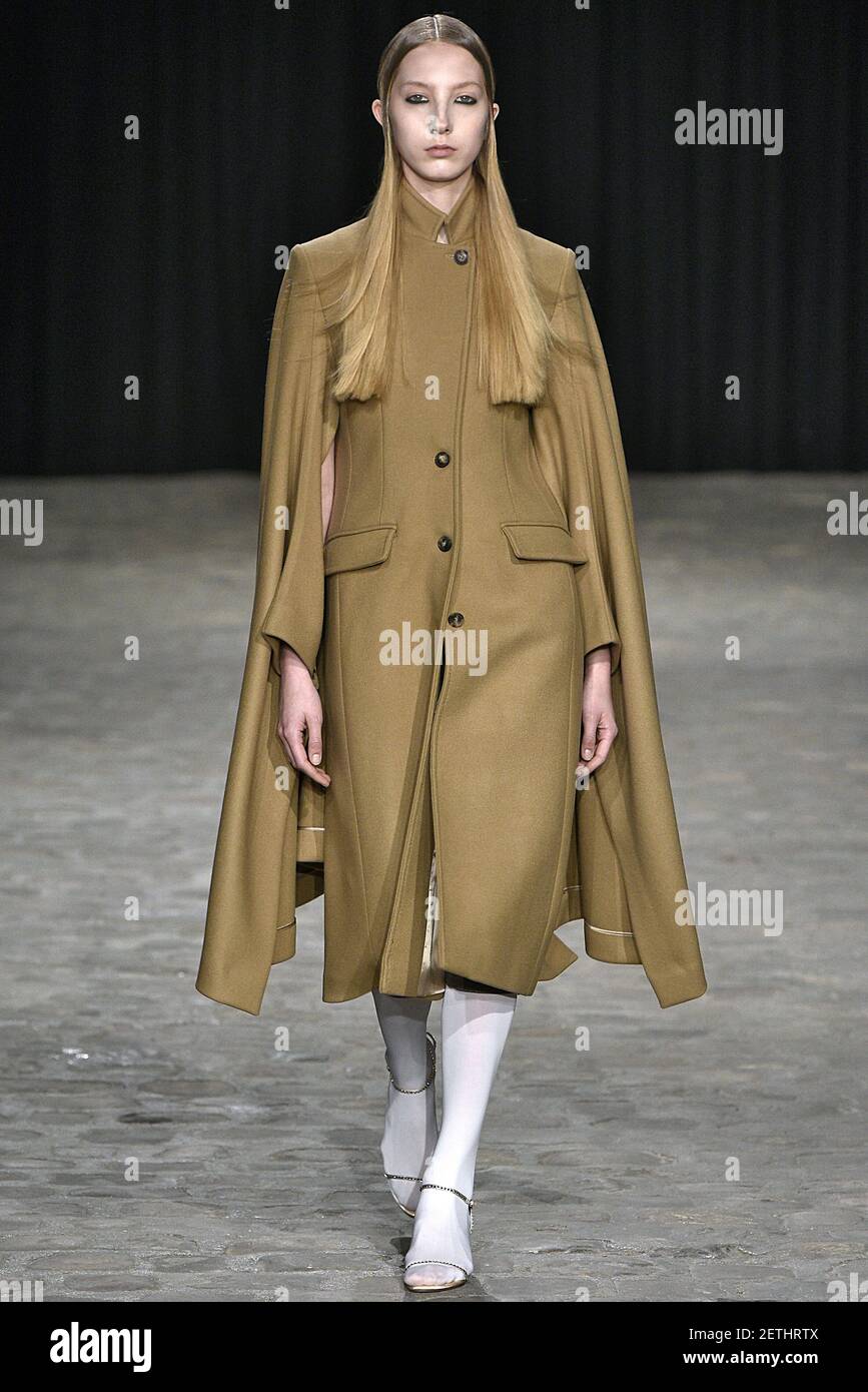 Model Sasha Komarova walks on the runway during the Veronique ...