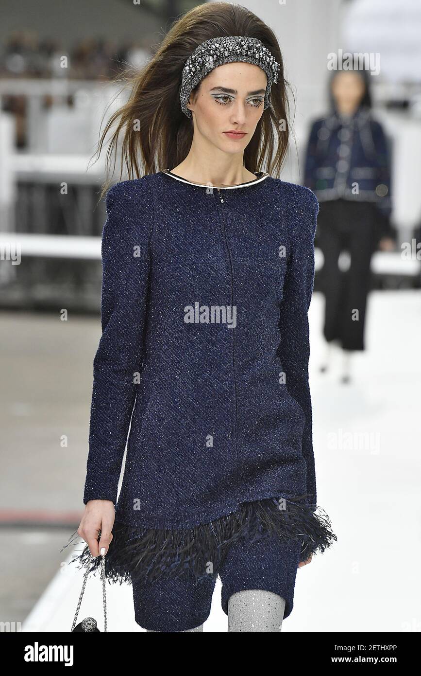Model Amanda Googe walks on the runway during the Chanel Fashion Show ...