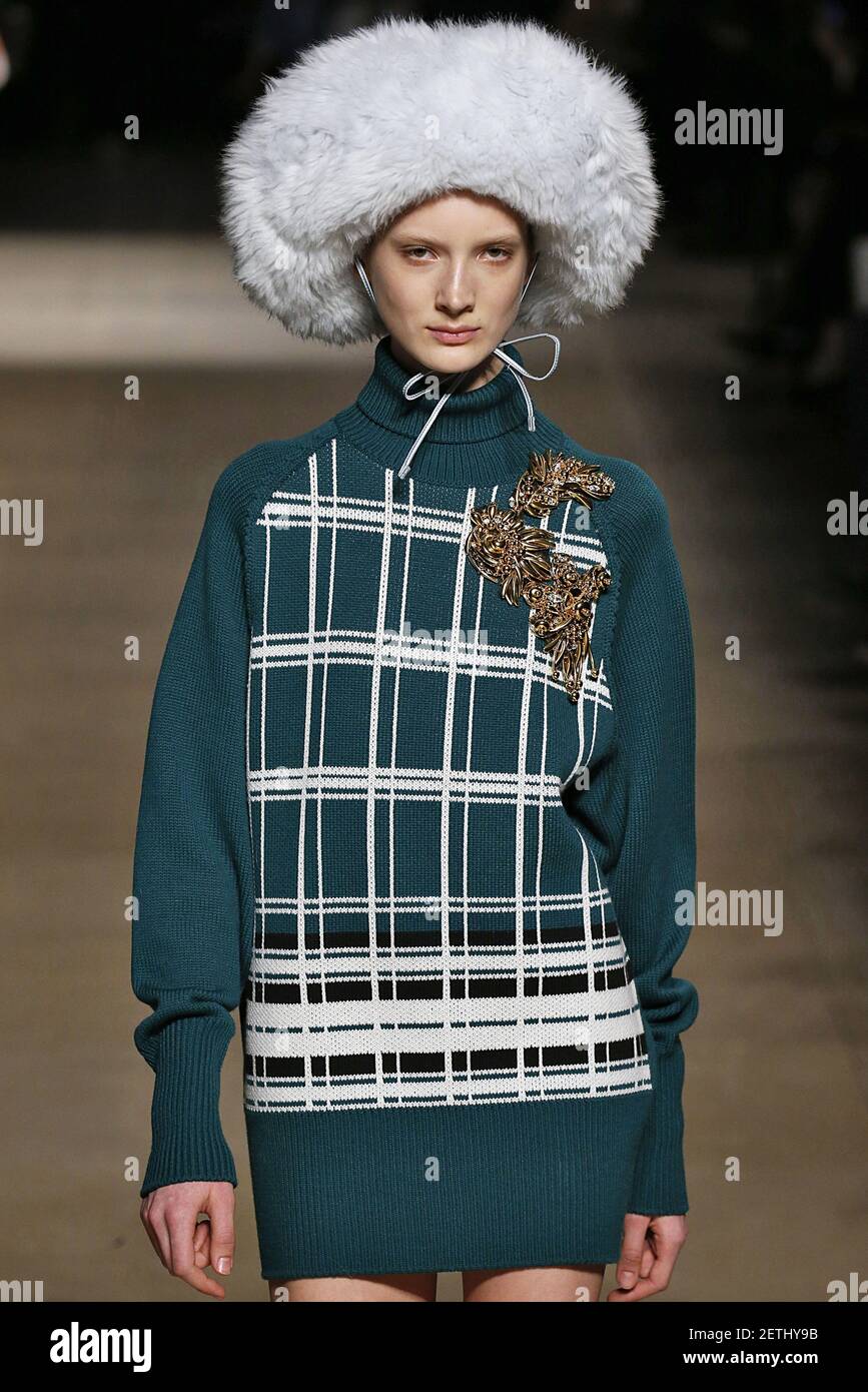 Model Regan Garrett walks on the runway during the Miu Miu Fashion Show ...
