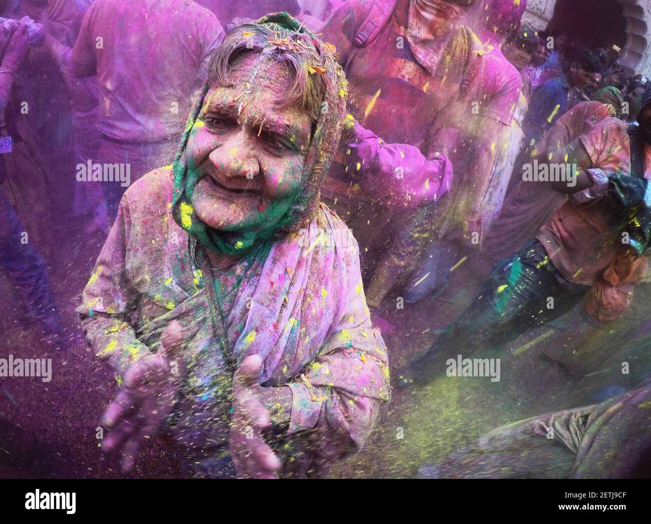 MUMBAI, INDIA - MARCH 9: A widow celebrating Holi festival with the ...