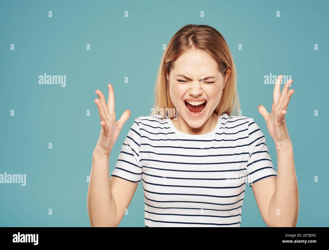 Emotional woman gesturing with her hands Screaming stress irritability ...