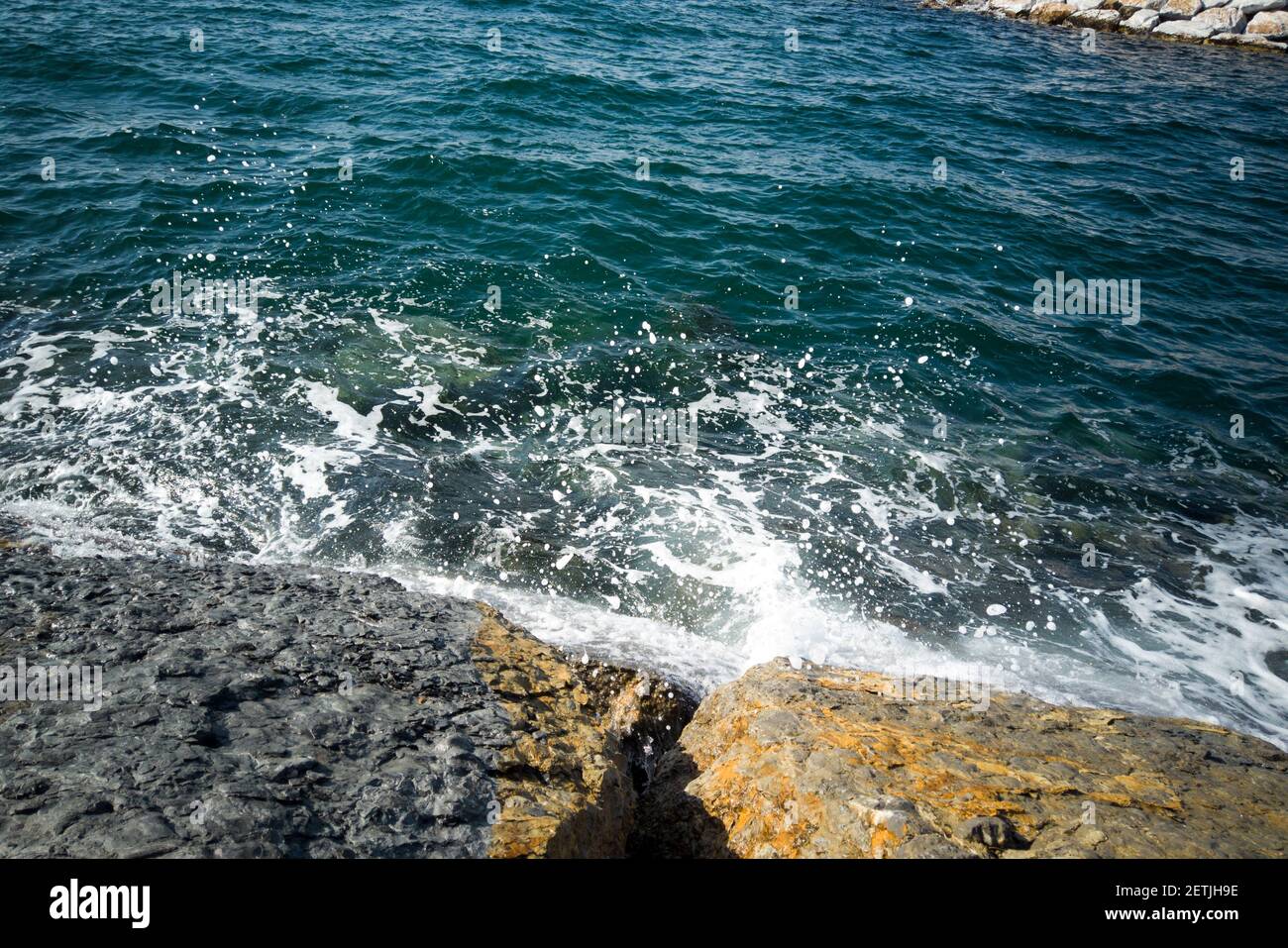 waves hitting rocks closer shot Stock Photo - Alamy