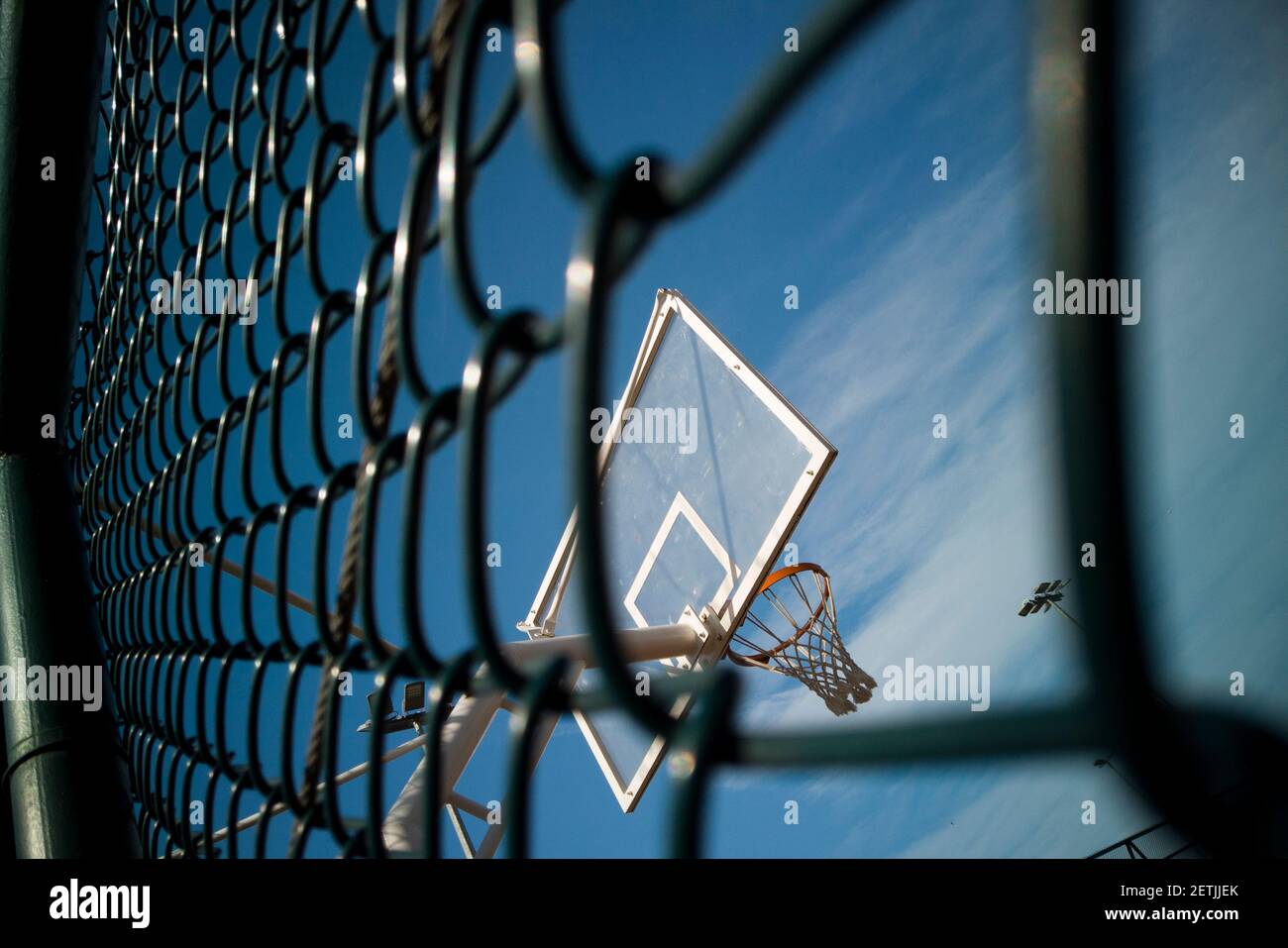 Basketball rim amazing shot with sky Stock Photo - Alamy