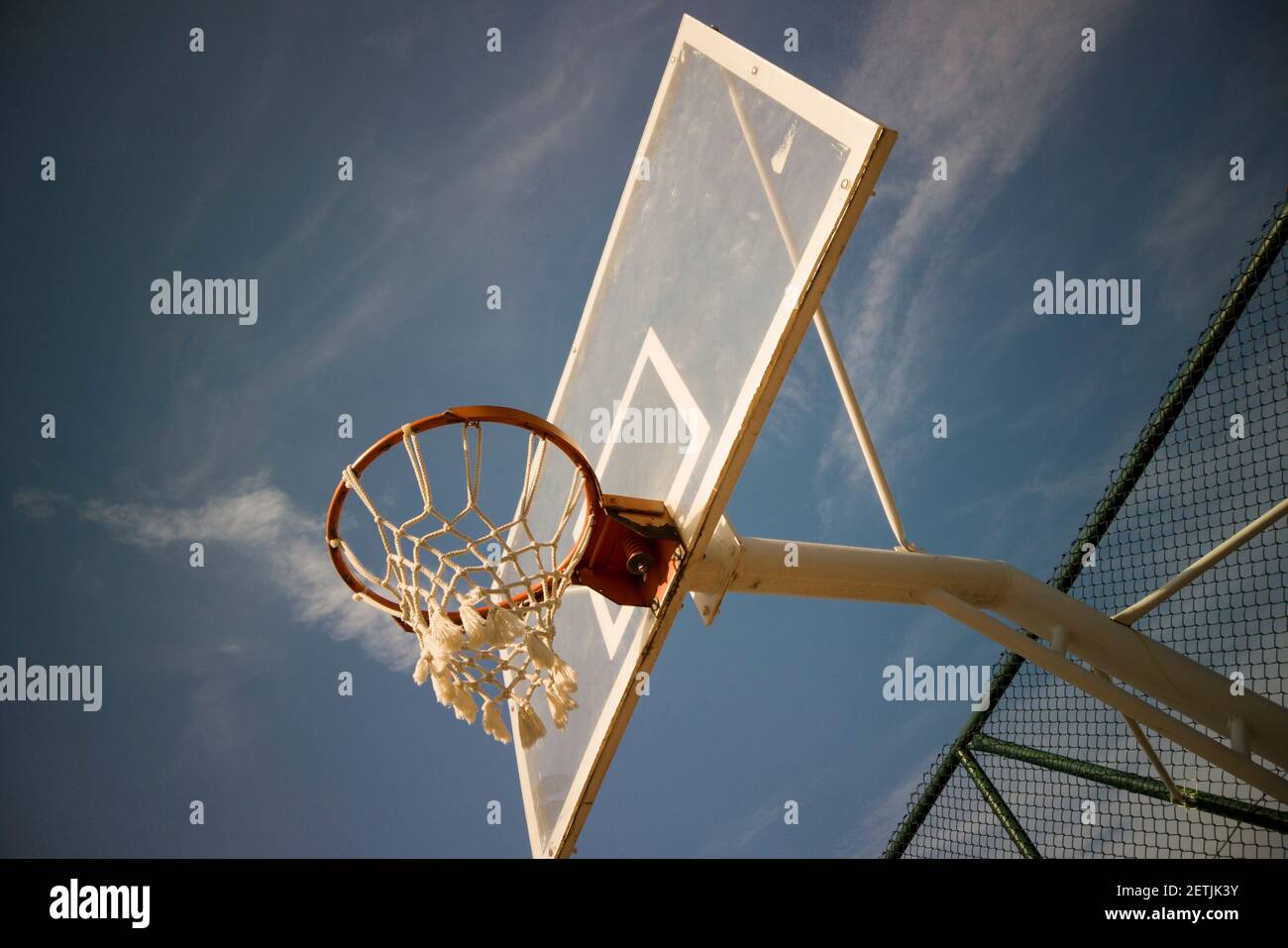 Basketball rim amazing shot with sky Stock Photo - Alamy