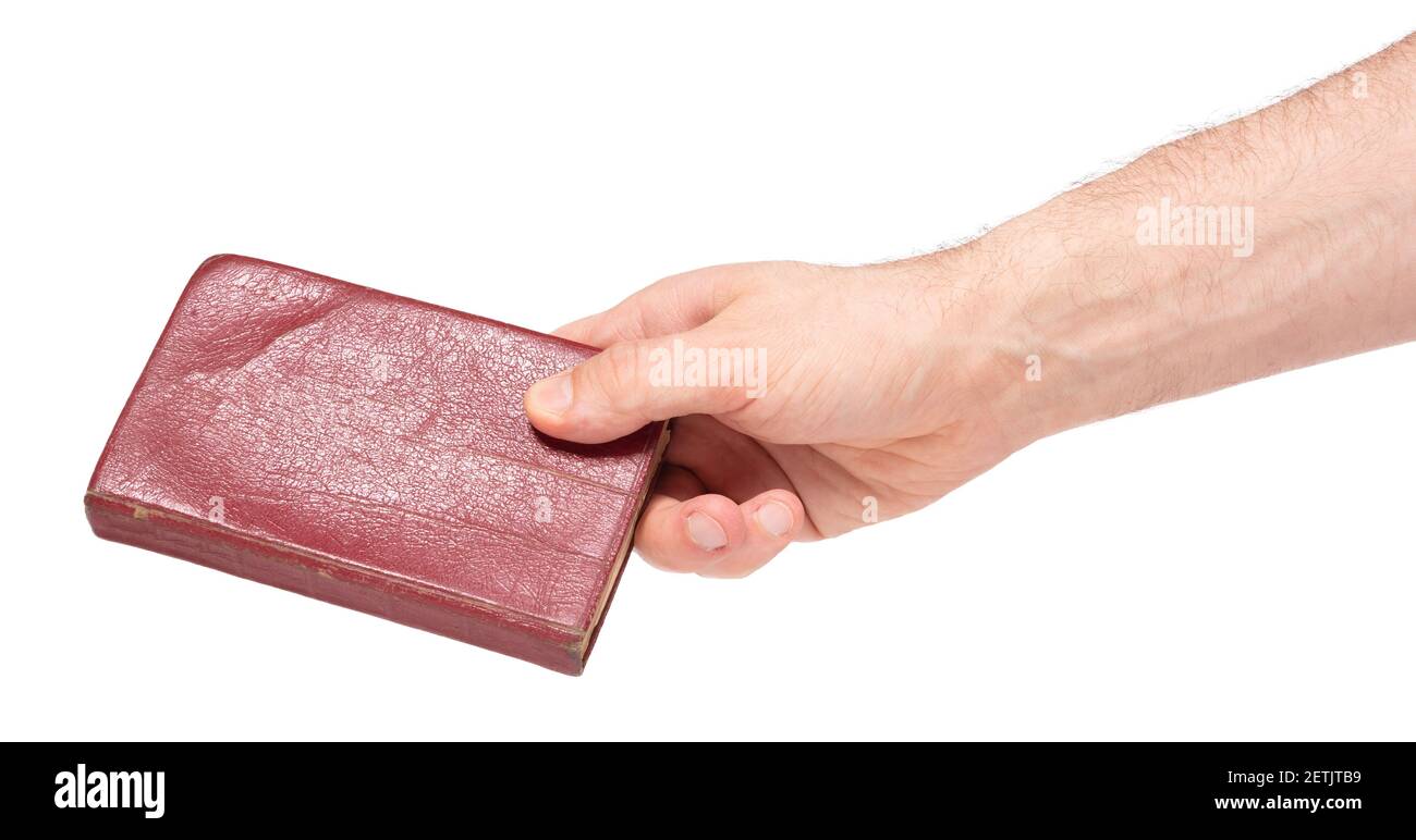Hand holding the old bible, giving, isolated on white Stock Photo - Alamy