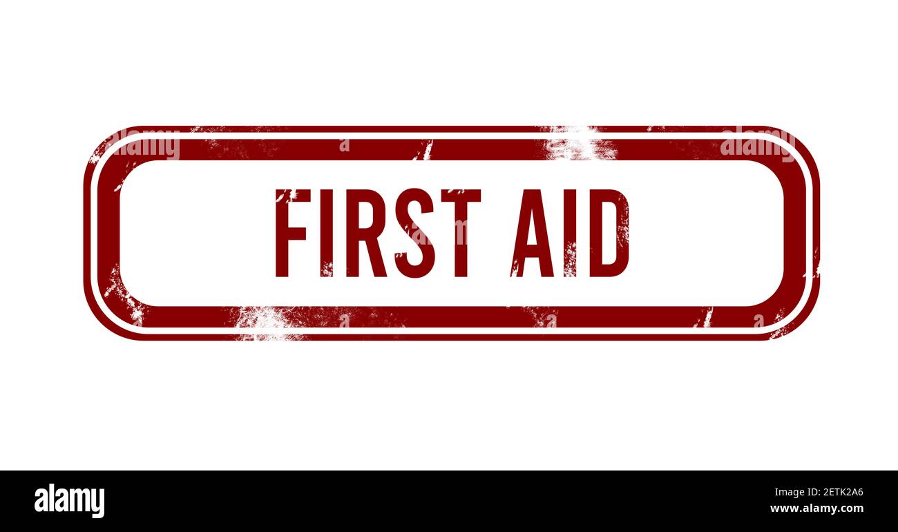 First Aid - red grunge button, stamp Stock Photo - Alamy