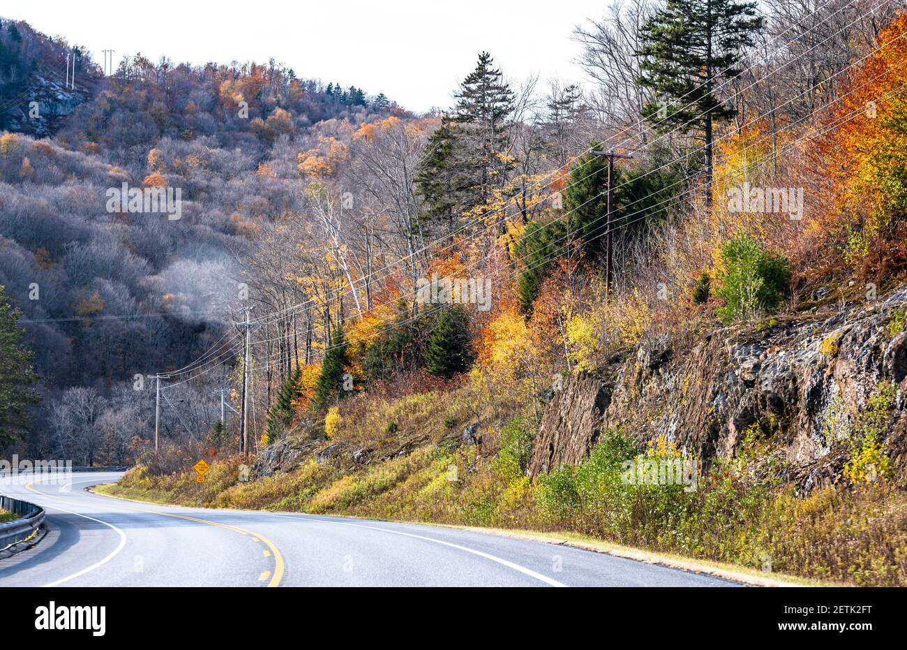Fascinating colorful winding Vermont highway road lined with autumn ...