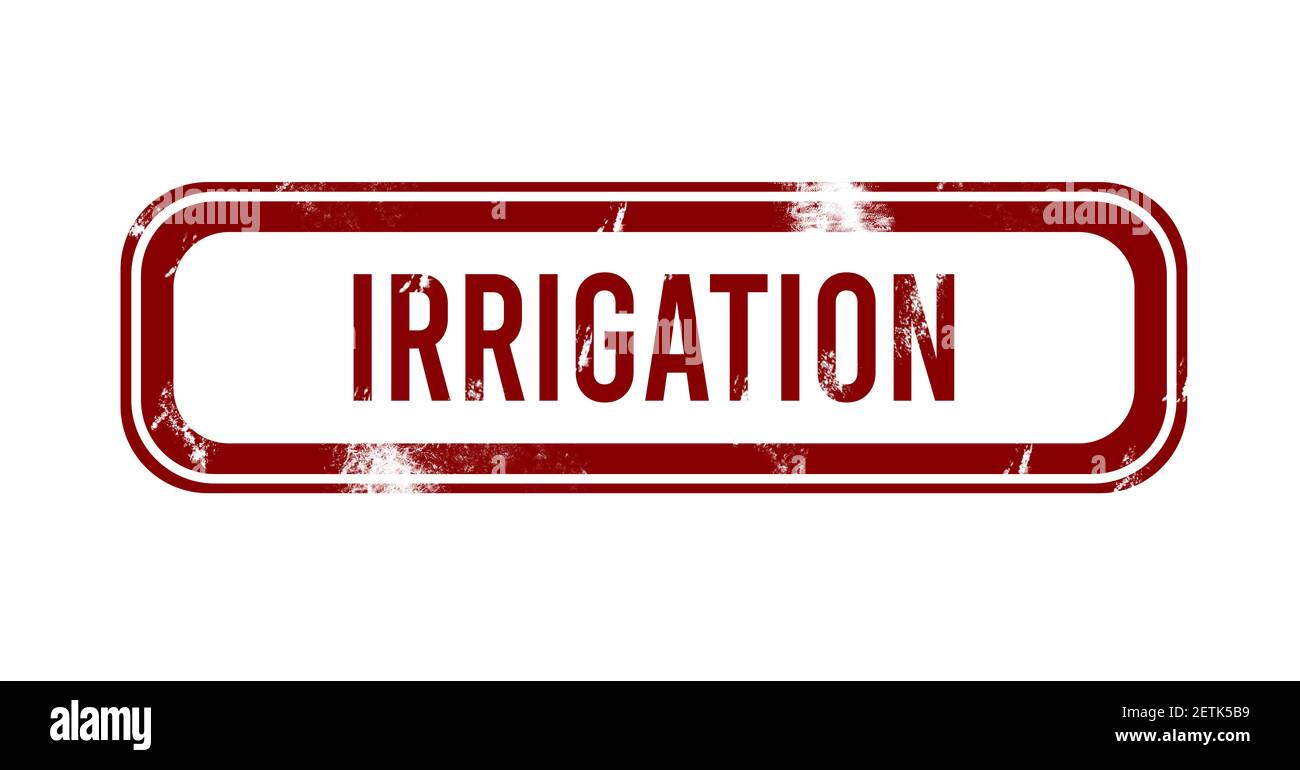 Irrigation - red grunge button, stamp Stock Photo - Alamy