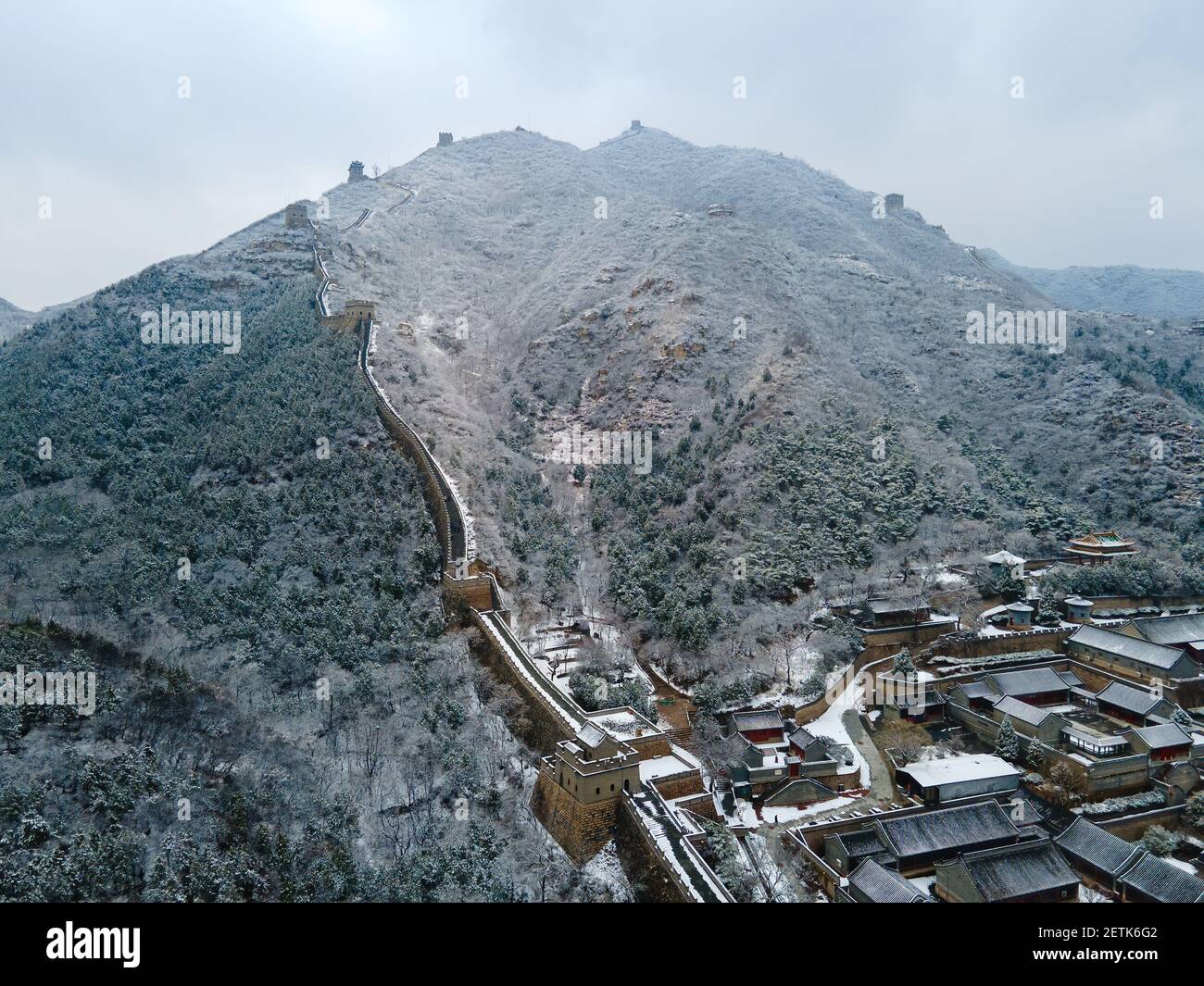 An aerial photo shows the snow-covered Juyong Pass of the Great Wall ...