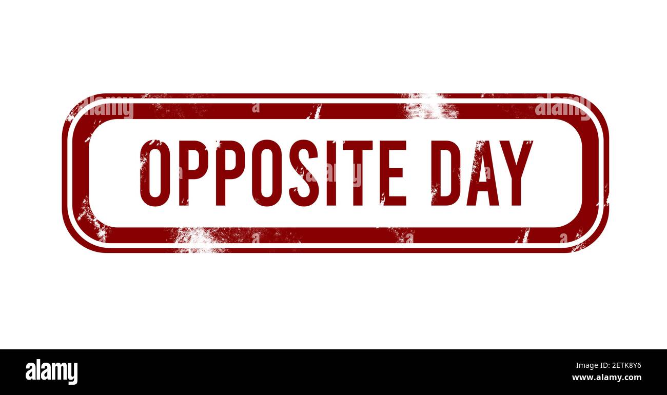 Opposite Day - red grunge button, stamp Stock Photo - Alamy