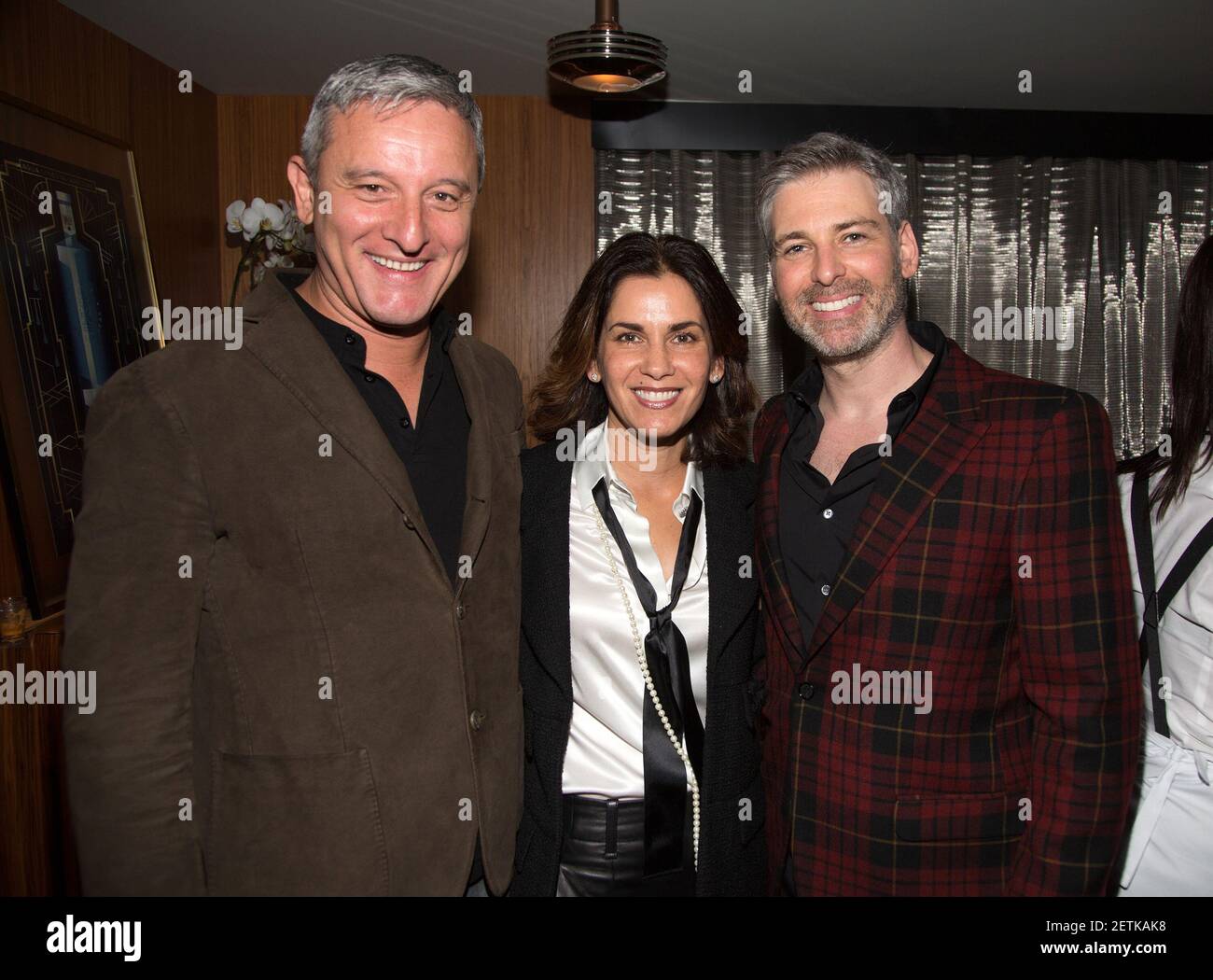 MIAMI, FLORIDA - MARCH 20: Lorenzo Braun, Sandra and Mir Seroussi are ...