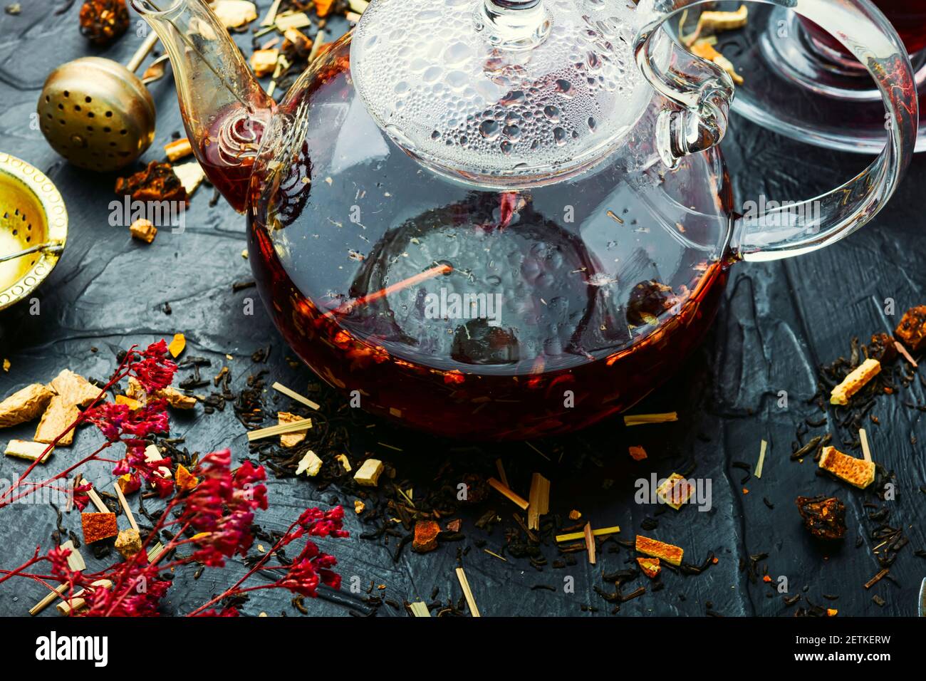 Healthy flower tea in a glass teapot.Natural herbs medicine Stock Photo ...
