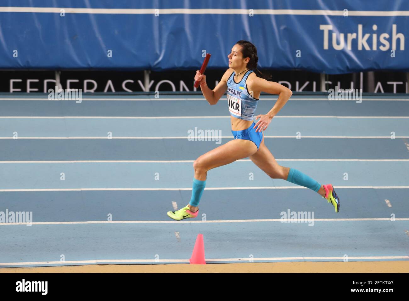 ISTANBUL, TURKEY - FEBRUARY 20, 2021: Undefined athlete running 4x400 ...