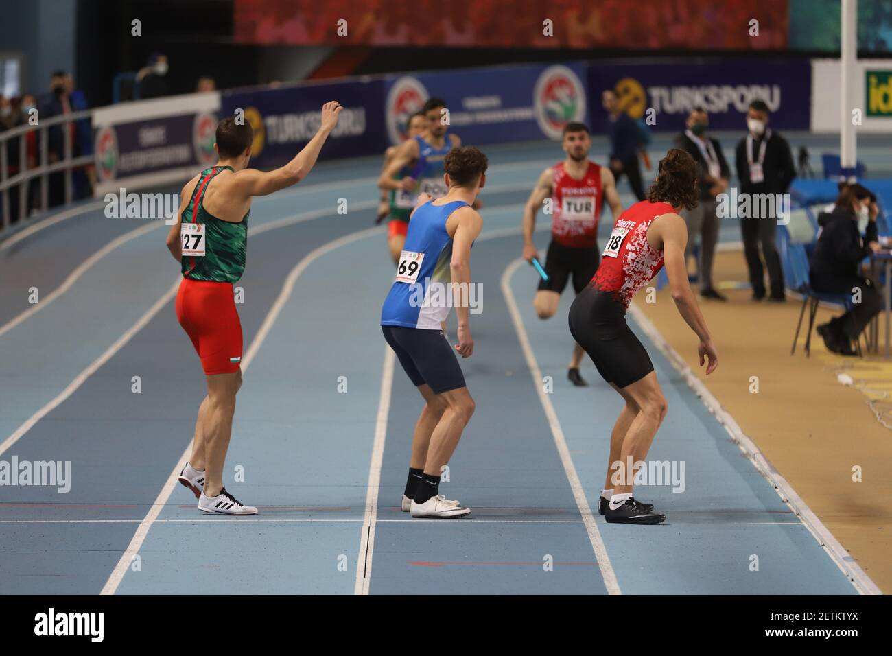 ISTANBUL, TURKEY - FEBRUARY 20, 2021: Athletes running 4x400 metres ...