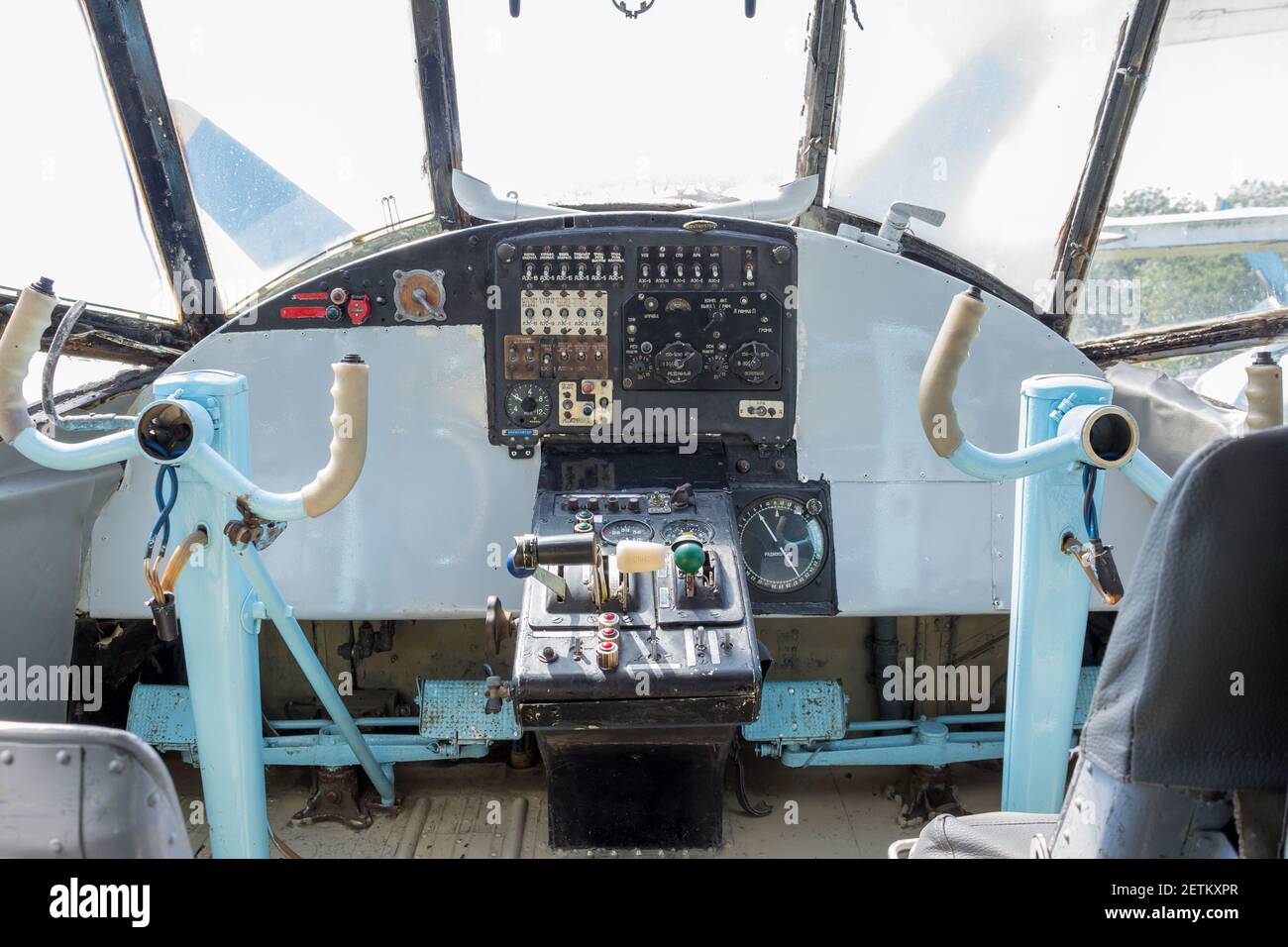 Vintage Russian biplane cockpit interior with steering wheels and ...