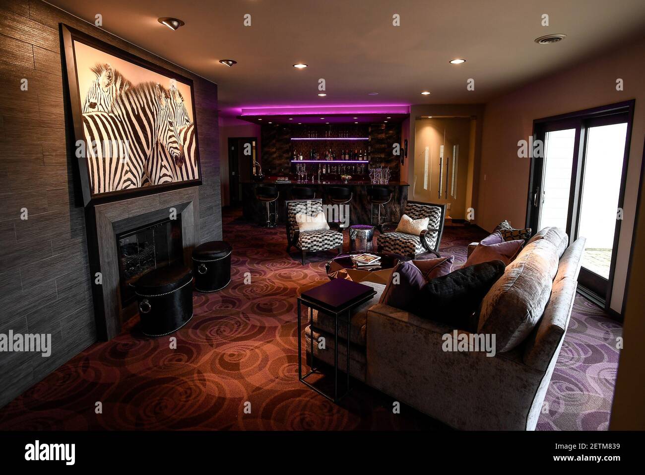 The lower level was designed for entertaining. (Photo by Aaron Lavinsky ...