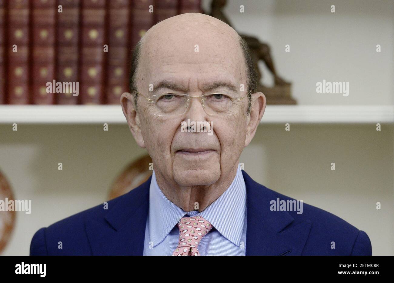 Secretary of commerce Wilbur Ross looks on before U.S. President Donald ...