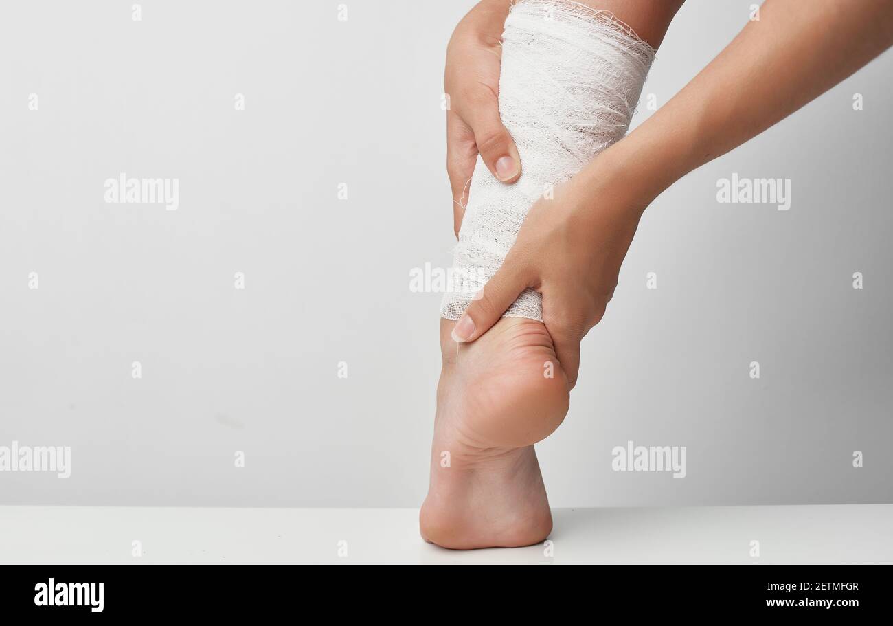 summer injury female leg bandage health problems pain Stock Photo - Alamy