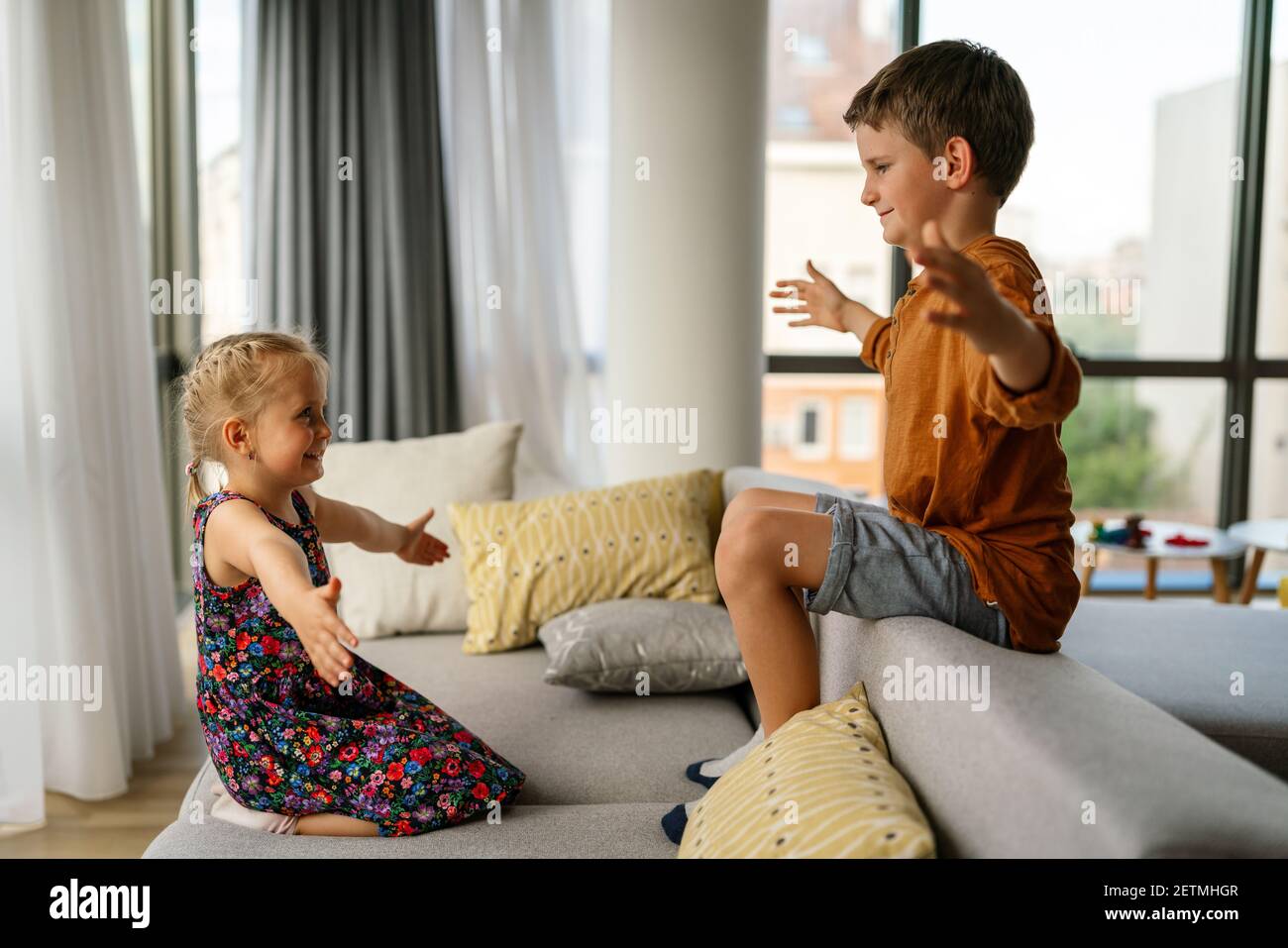 Little kids, siblings hug and cuddle at home show love and care. Family ...