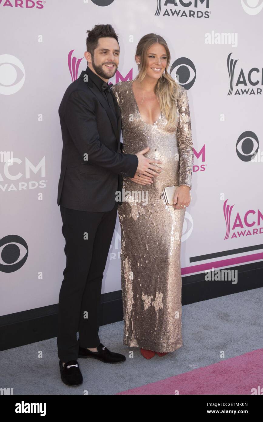 Thomas Rhett, left, and Lauren Gregory arrive on the red carpet at the ...