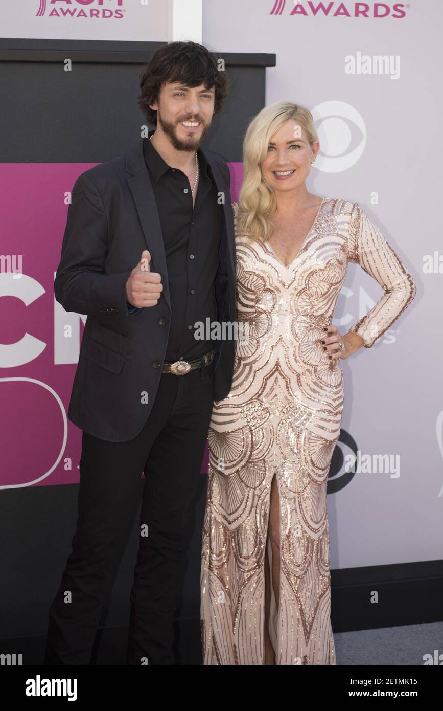 Chris Janson, left, and Kelly Lynn arrive on the red carpet at the ...