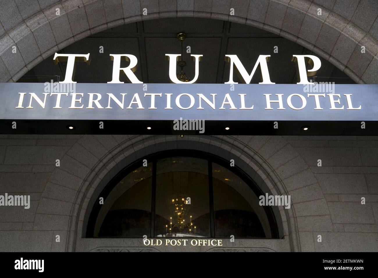 A logo sign outside of the Trump International Hotel in the Old Post ...