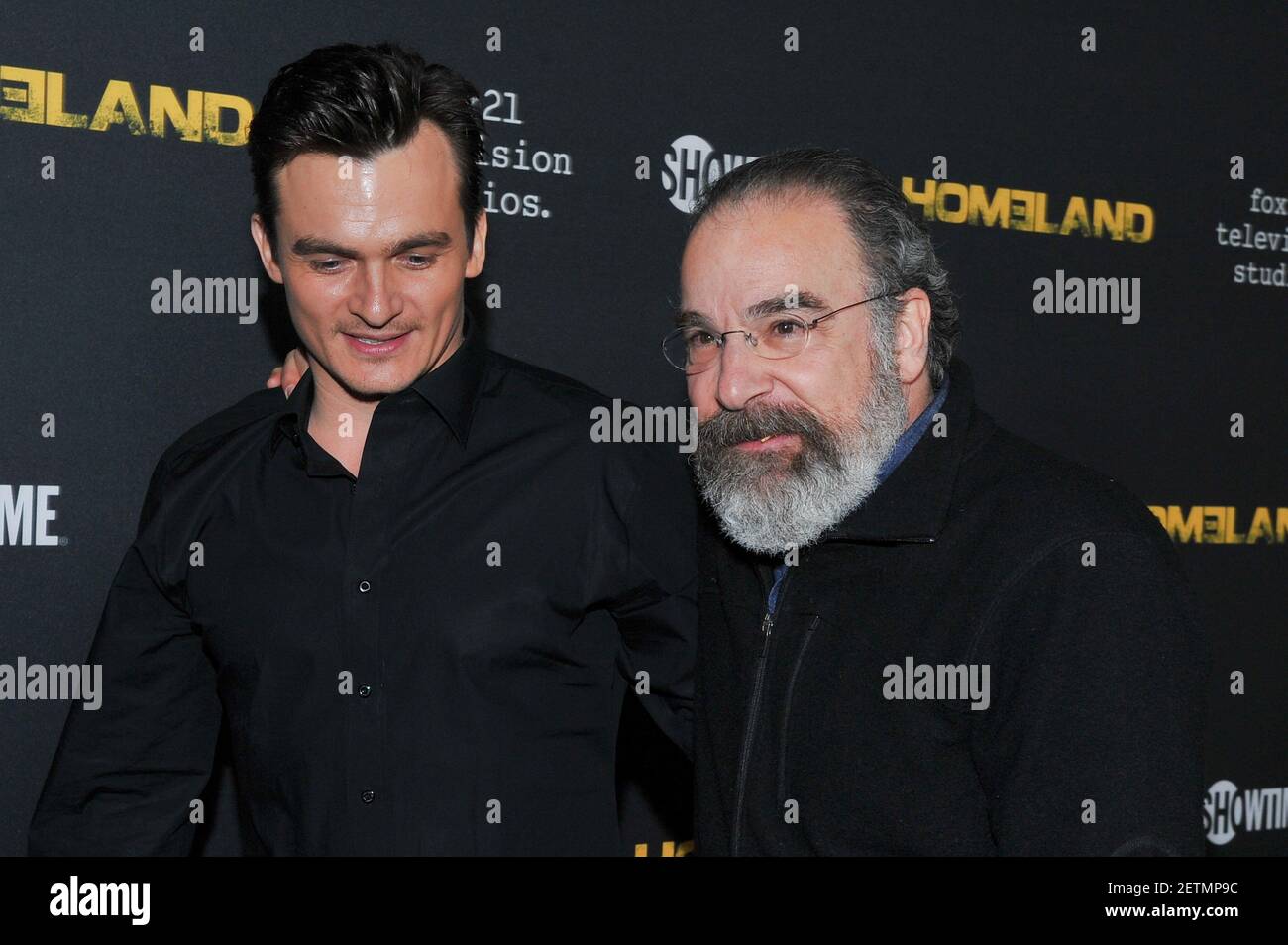 HOLLYWOOD, CA - APRIL 3: Rupert Friend and Mandy Patinkin attend a ...