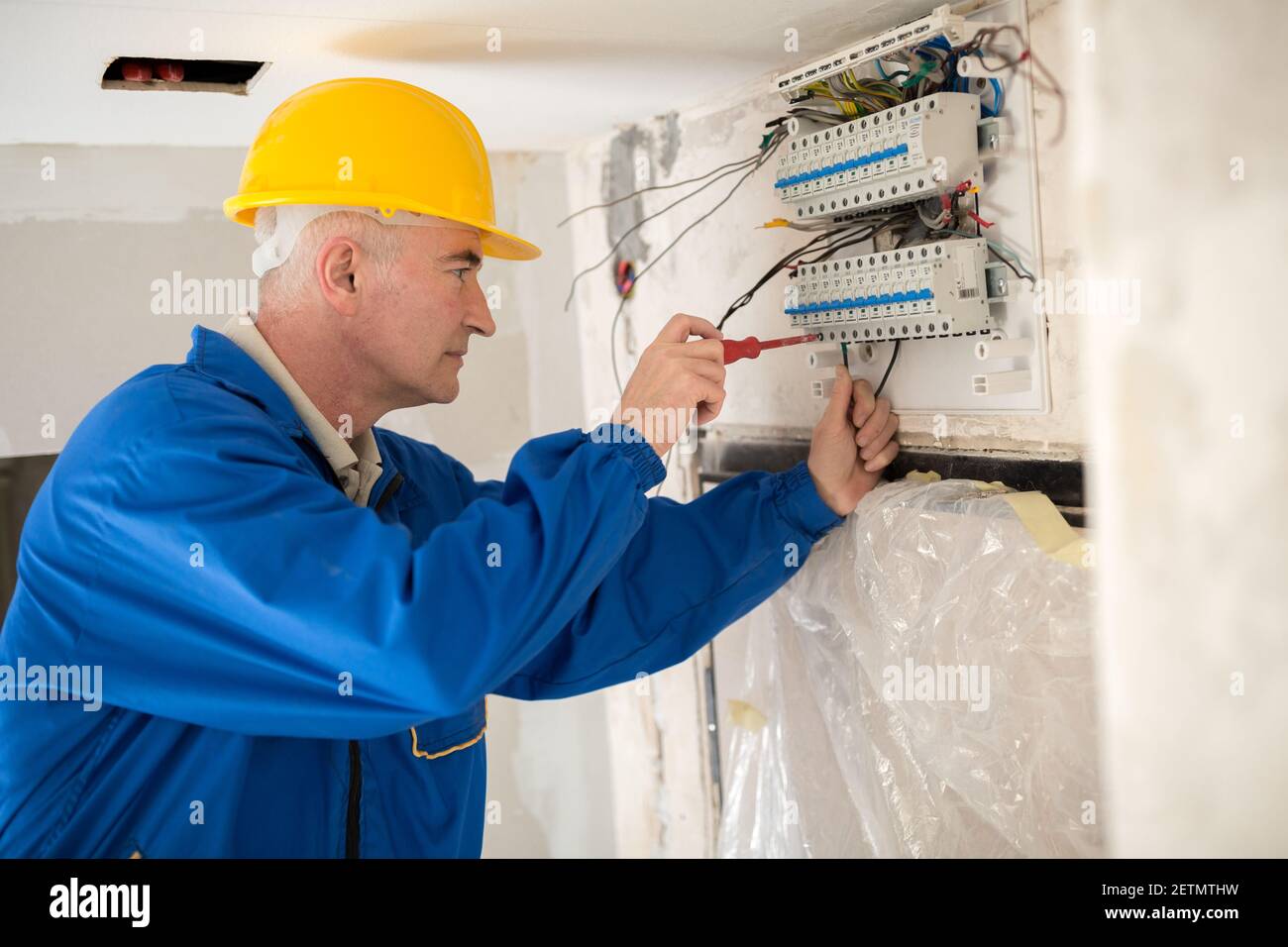Finishing touches of a skilled electrician and connecting of ...