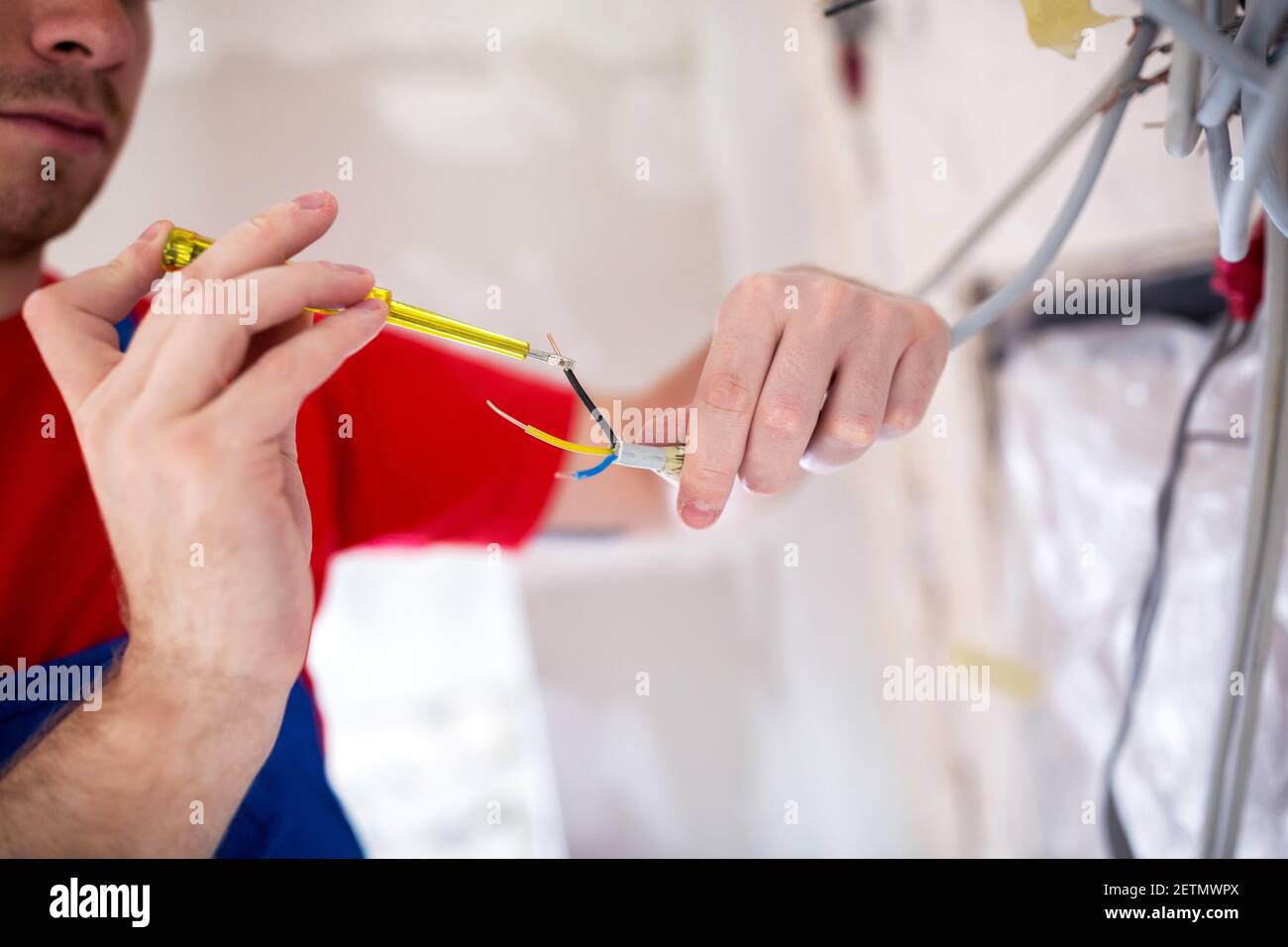 Pro electrician demonstrating a high degree of skill and competence in ...