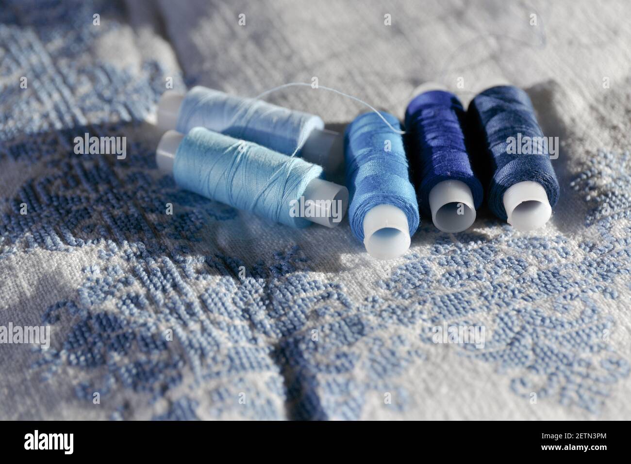 Blue thread. Set of sewing thread coils. Several reels of thread in ...