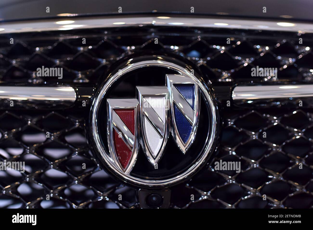 Buick emblem on the front grill of the 2018 Buick Enclave "Avenir" is ...