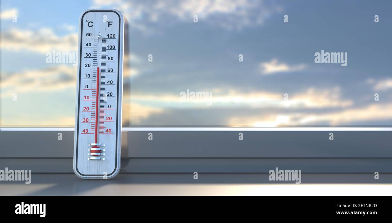 Weather thermometer on a glass window sill, room interior. Comfort warm ...