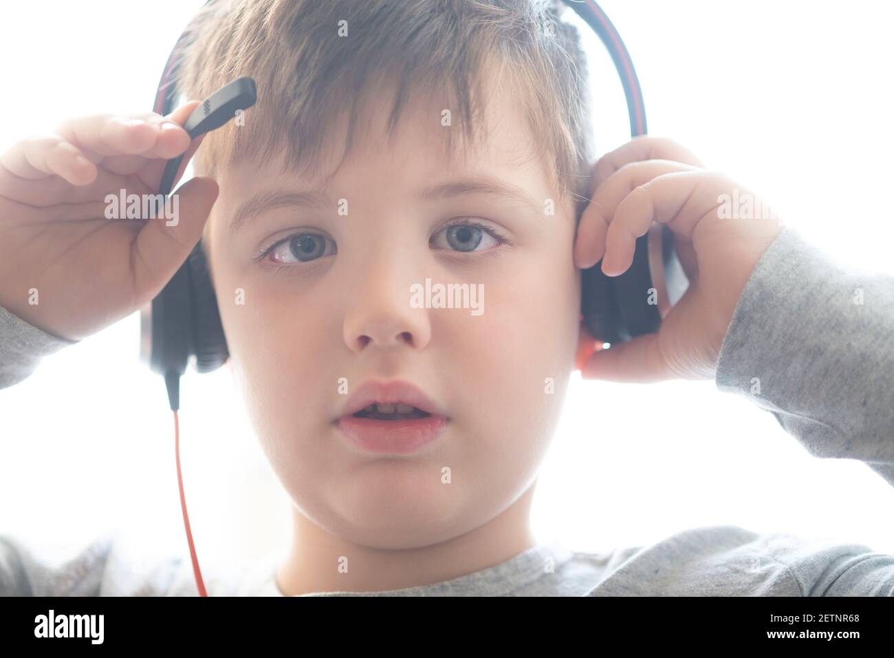 Boy in Headset Stock Photo - Alamy