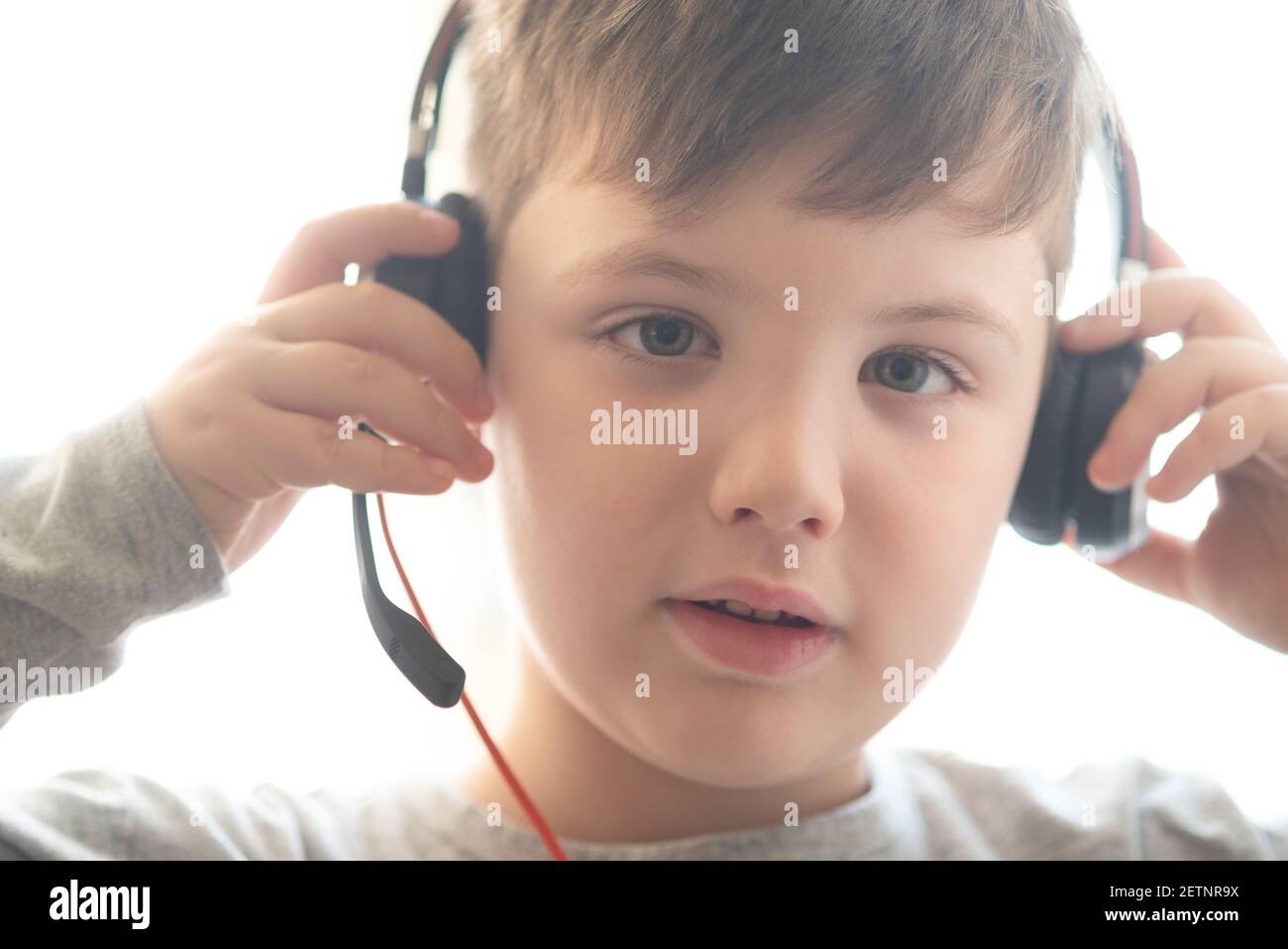 Boy in Headset Stock Photo - Alamy