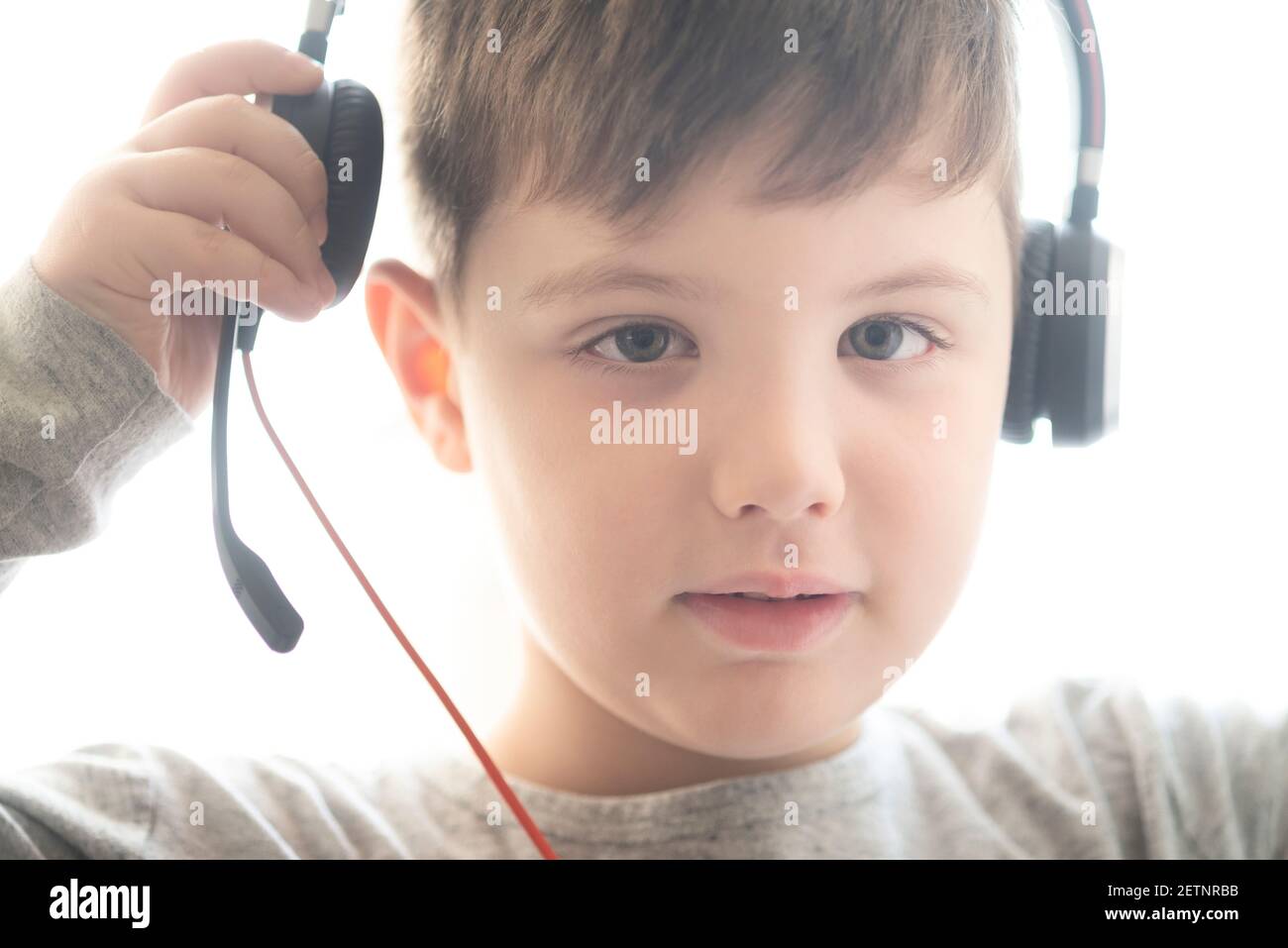 Boy in Headset Stock Photo - Alamy