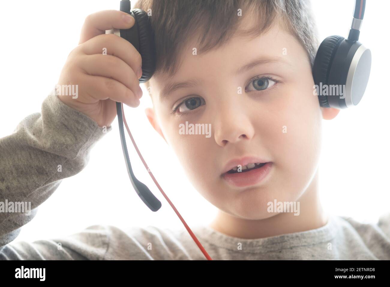 Boy in Headset Stock Photo - Alamy