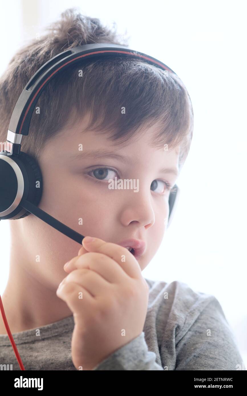 Boy in Headset Stock Photo - Alamy