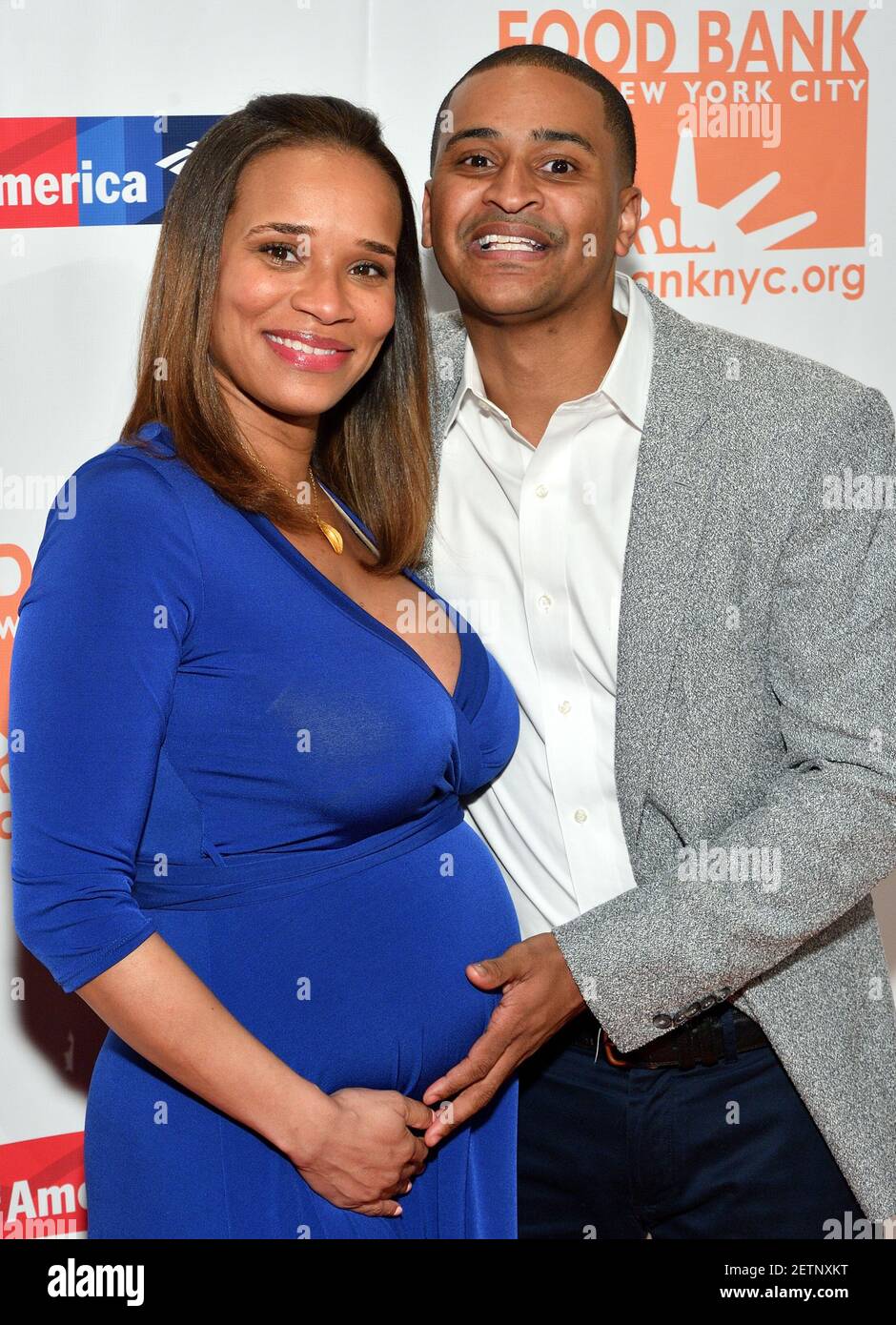 L-R: Mia Johnson and chef Joseph JJ Johnson attend the Food Bank for ...