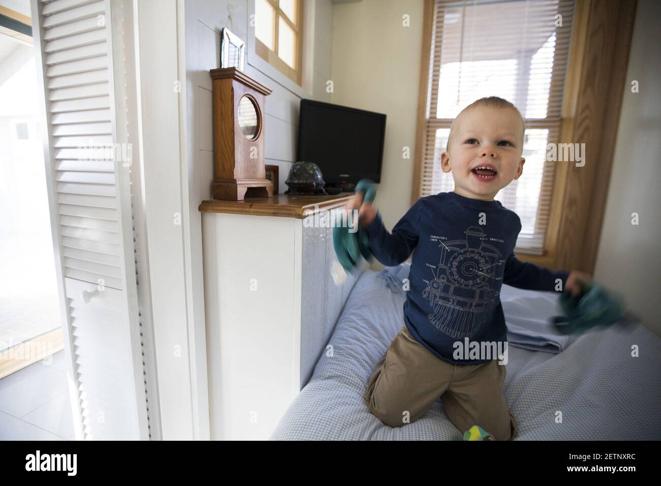Matthew Mikkelson enjoys playing in his cupboard bed. (Photo by Leila ...