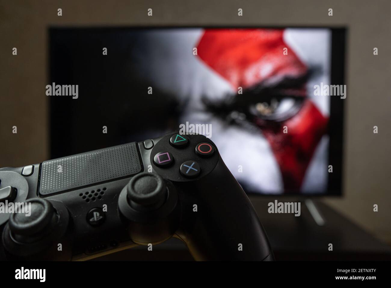 Point of view video gaming. Playing video game on Playstation. God of ...