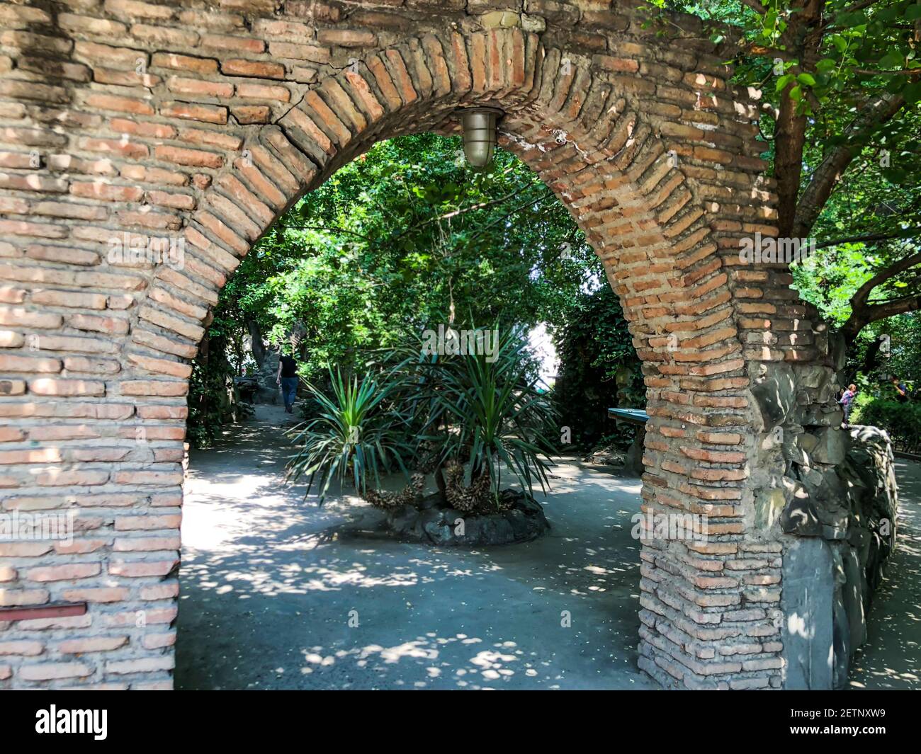 Old red brick entrance in church yard Stock Photo - Alamy