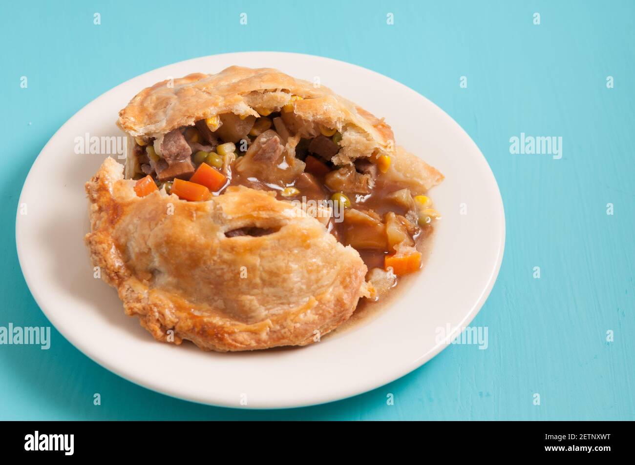 meat pie made with roast beef in a savoury gravy Stock Photo - Alamy