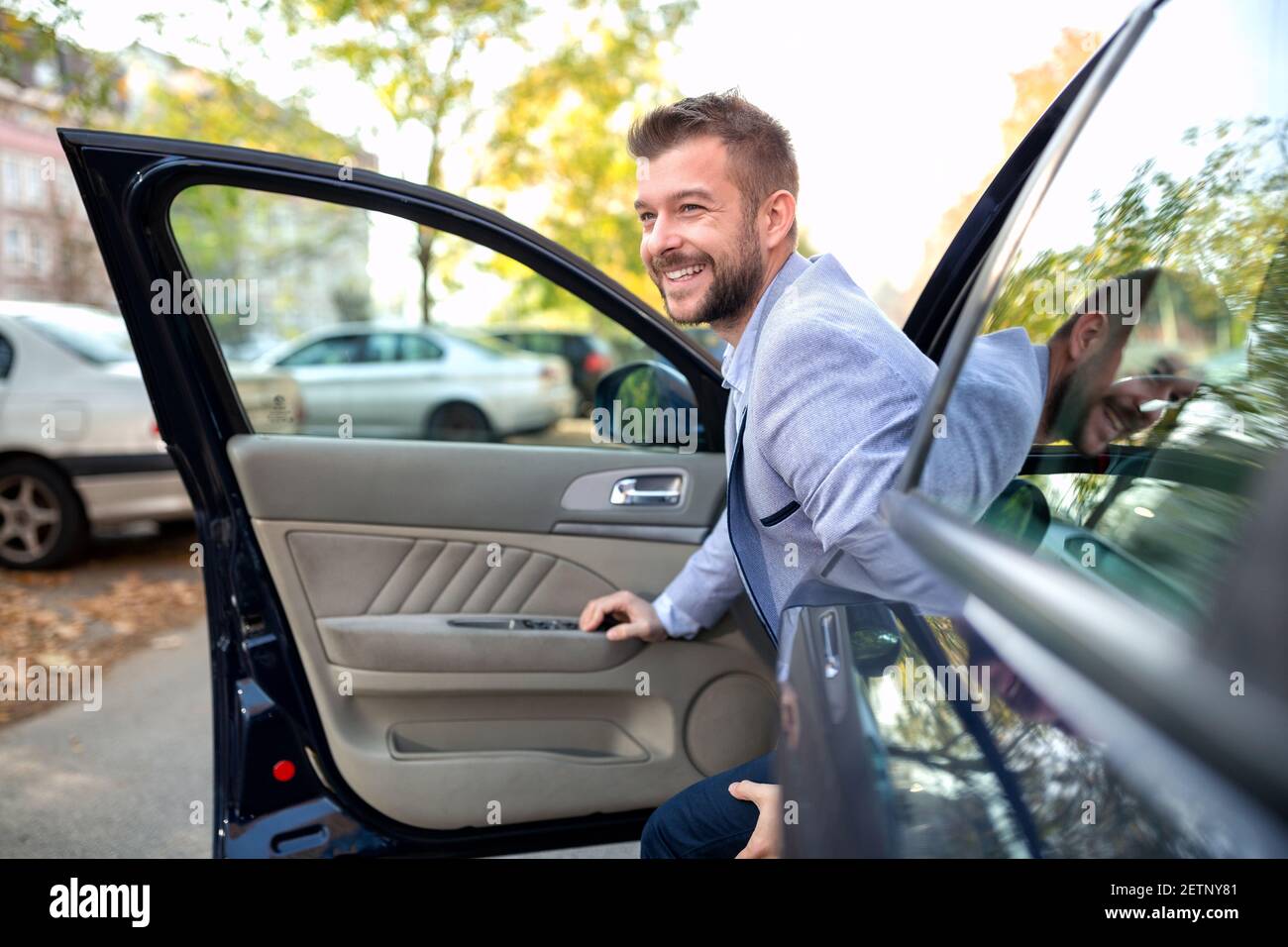 Man exiting car hi-res stock photography and images - Alamy