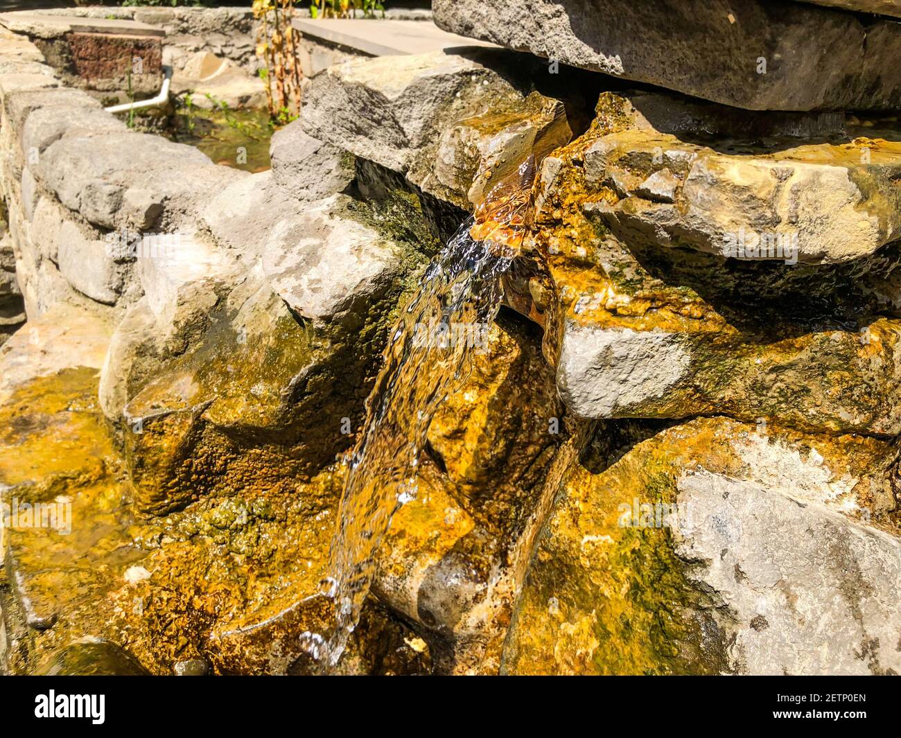 Spring water at an ancient orthodox church yard Stock Photo - Alamy